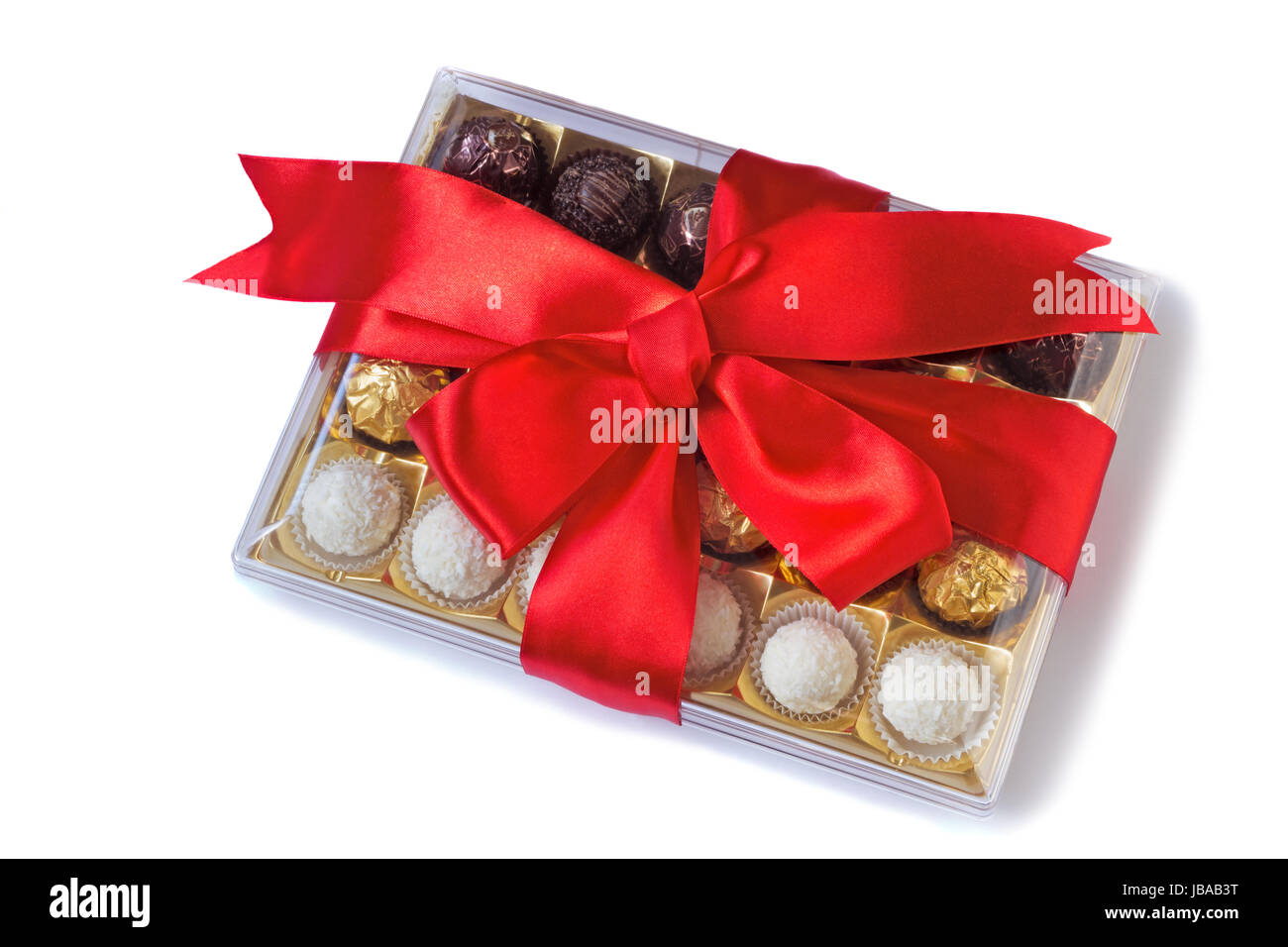 Box of delicious chocolates, nicely decorated and tied with a ribbon ...