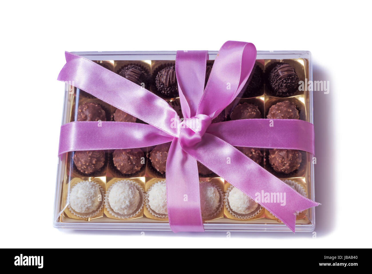 Box of delicious chocolates, nicely decorated and tied with a ribbon ...