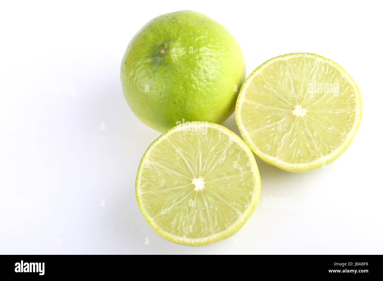 Fresh lime isolated on white background Stock Photo - Alamy