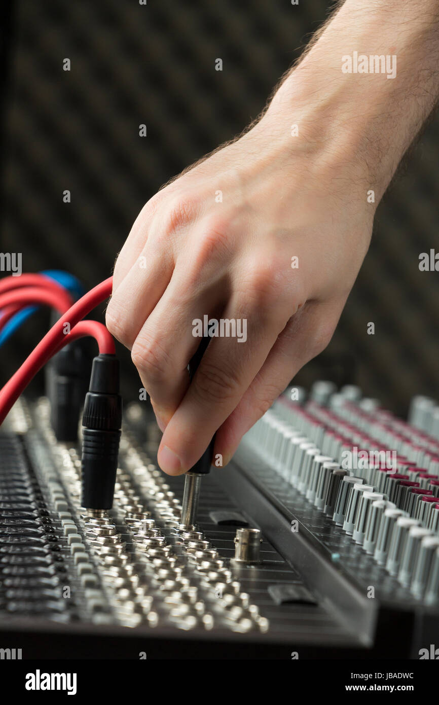 Audio jack connecting on a studio mixer (Series available Stock Photo ...