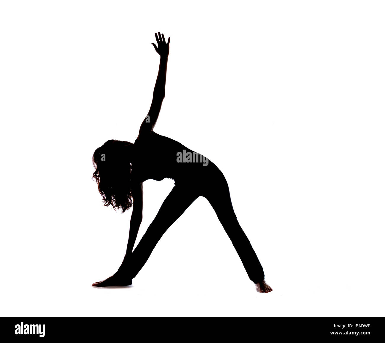 Woman in Extended Triangle Pose in Yoga (Series with the same model ...