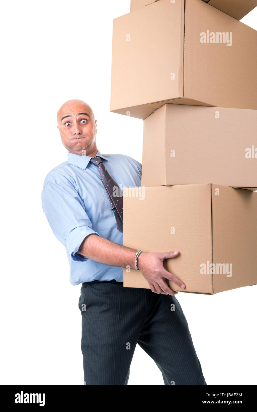 Businessman carrying a stack of cardboard boxes Stock Photo - Alamy
