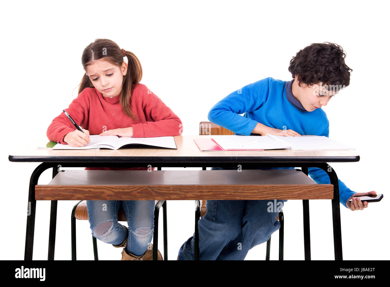 Boy cheating with cellphone in the classroom Stock Photo - Alamy