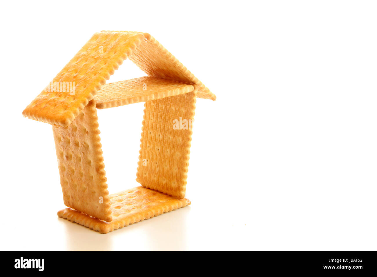 small house made by biscuit on the white background Stock Photo - Alamy