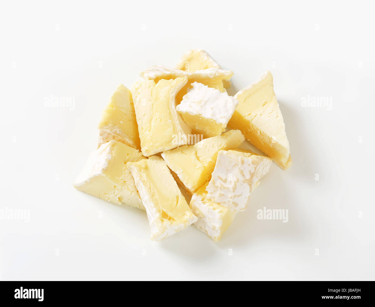 Pieces of French white rind cheese Stock Photo - Alamy