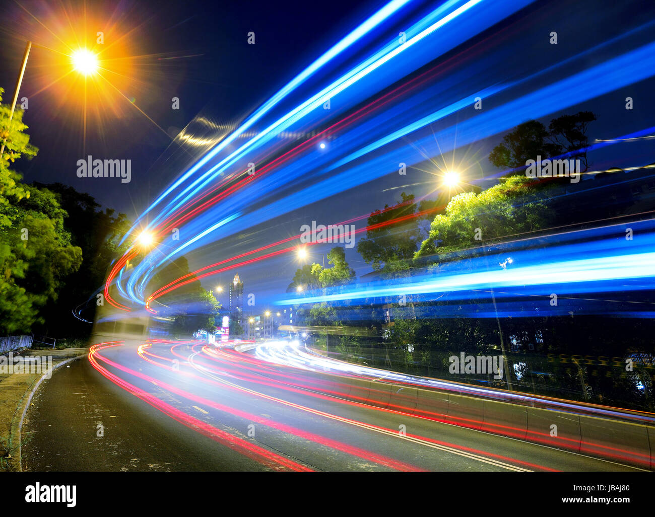 Busy traffic on road at night Stock Photo - Alamy