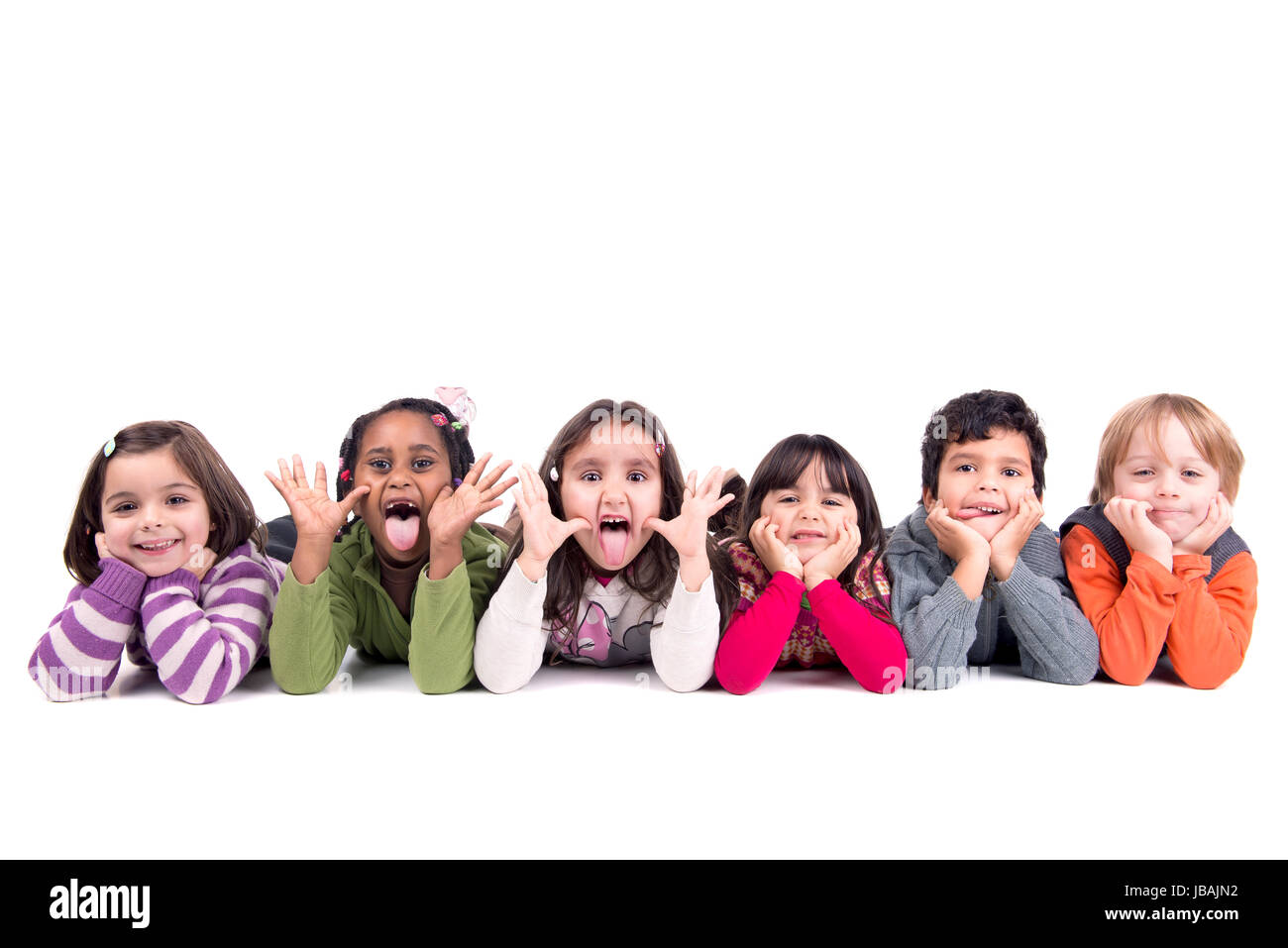Group of children making funny faces isolated in white Stock Photo - Alamy