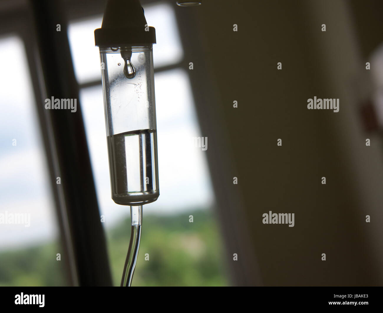 Infusion bottle with IV intravenous solution in hospital Stock Photo ...