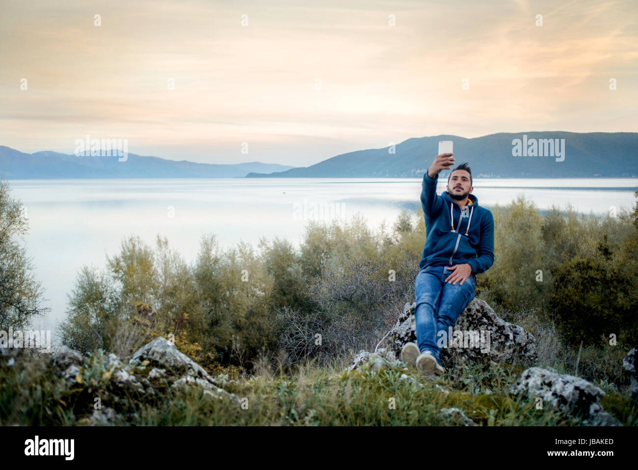 picture of a young handsome male model in nature Stock Photo - Alamy