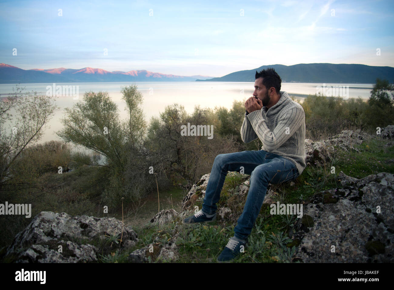 picture of a young handsome male model in nature Stock Photo - Alamy