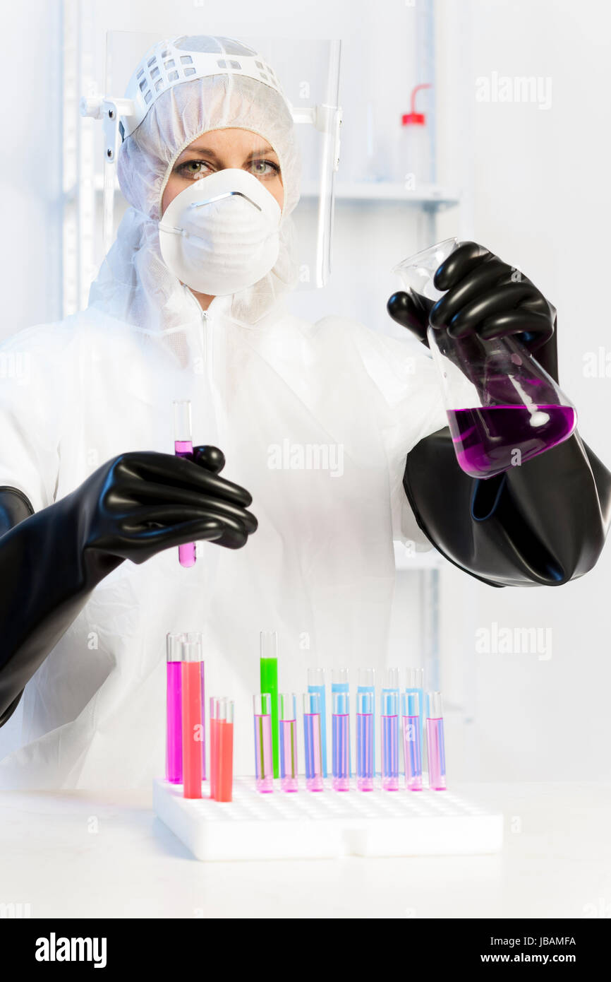 young woman wearing protective clothes in laboratory Stock Photo - Alamy