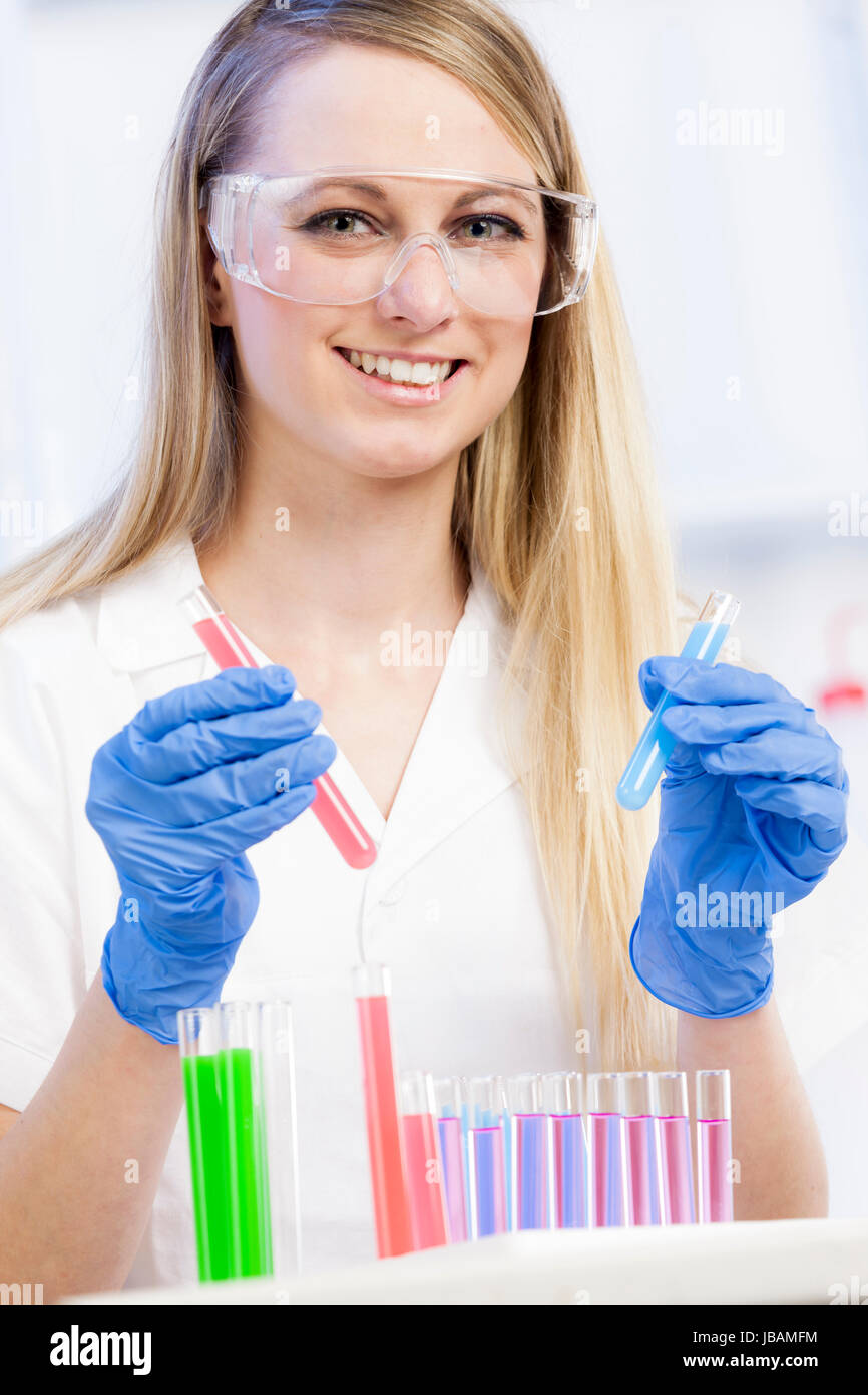 young woman in laboratory Stock Photo - Alamy