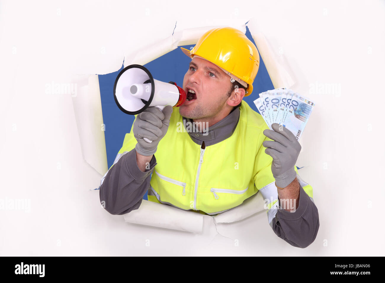 Construction worker with megaphone and money Stock Photo - Alamy