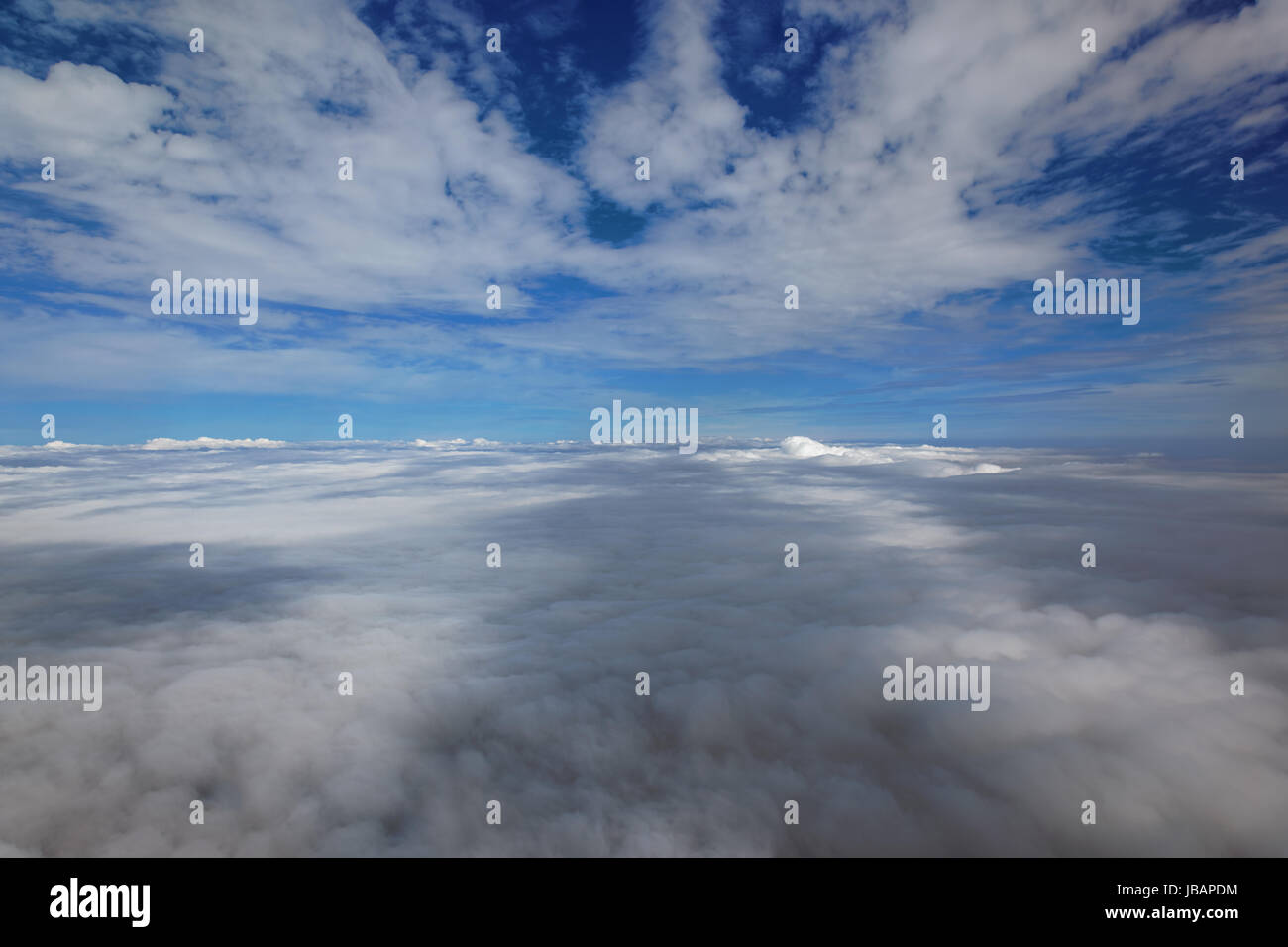 clouds out of an aeroplane window Stock Photo - Alamy