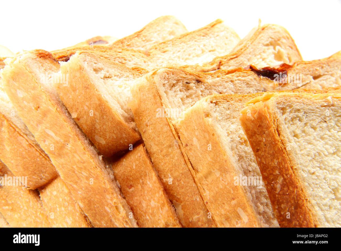 delicious bread in pieces on white background Stock Photo - Alamy