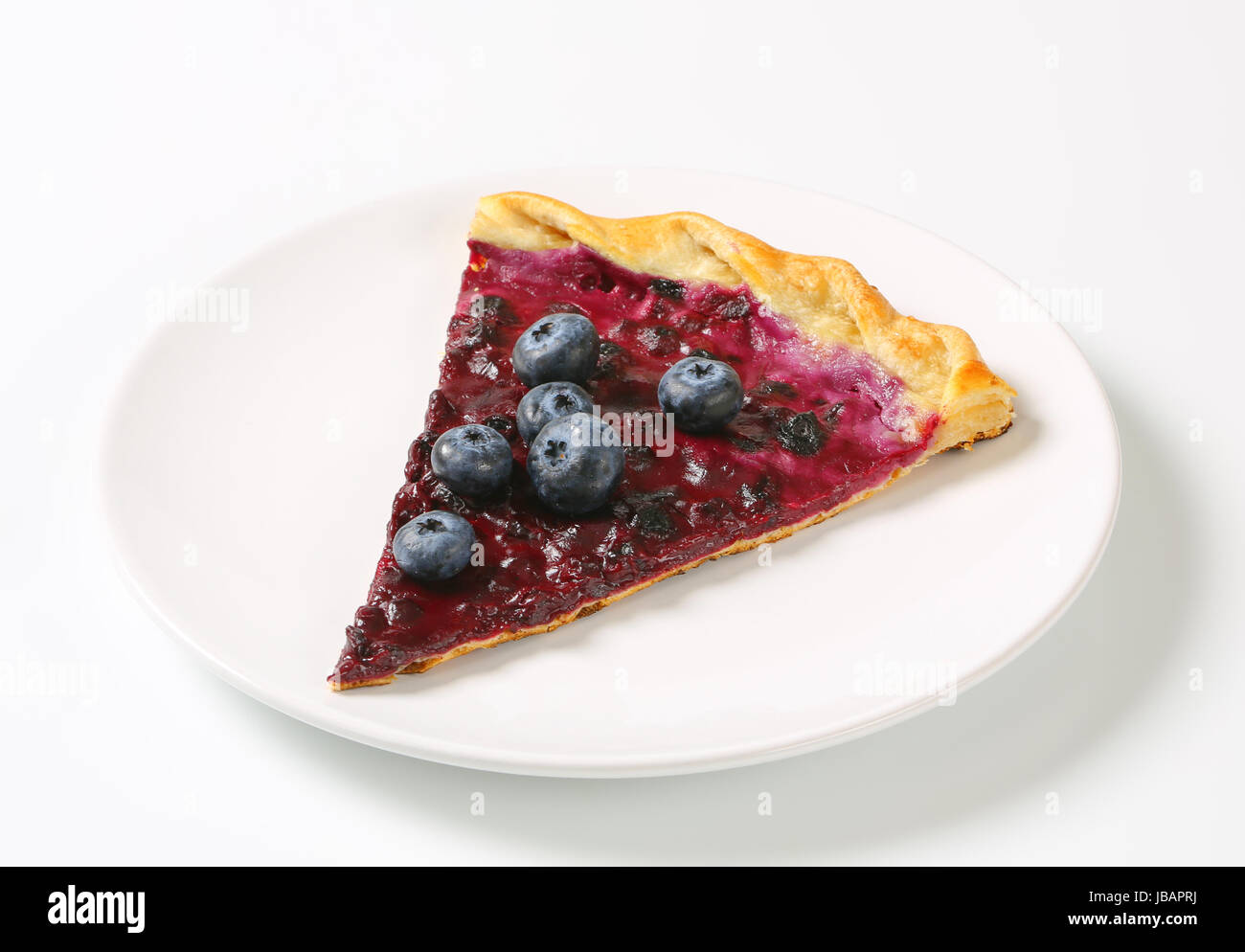 French cuisine - Quark and blueberry flammkuchen Stock Photo - Alamy