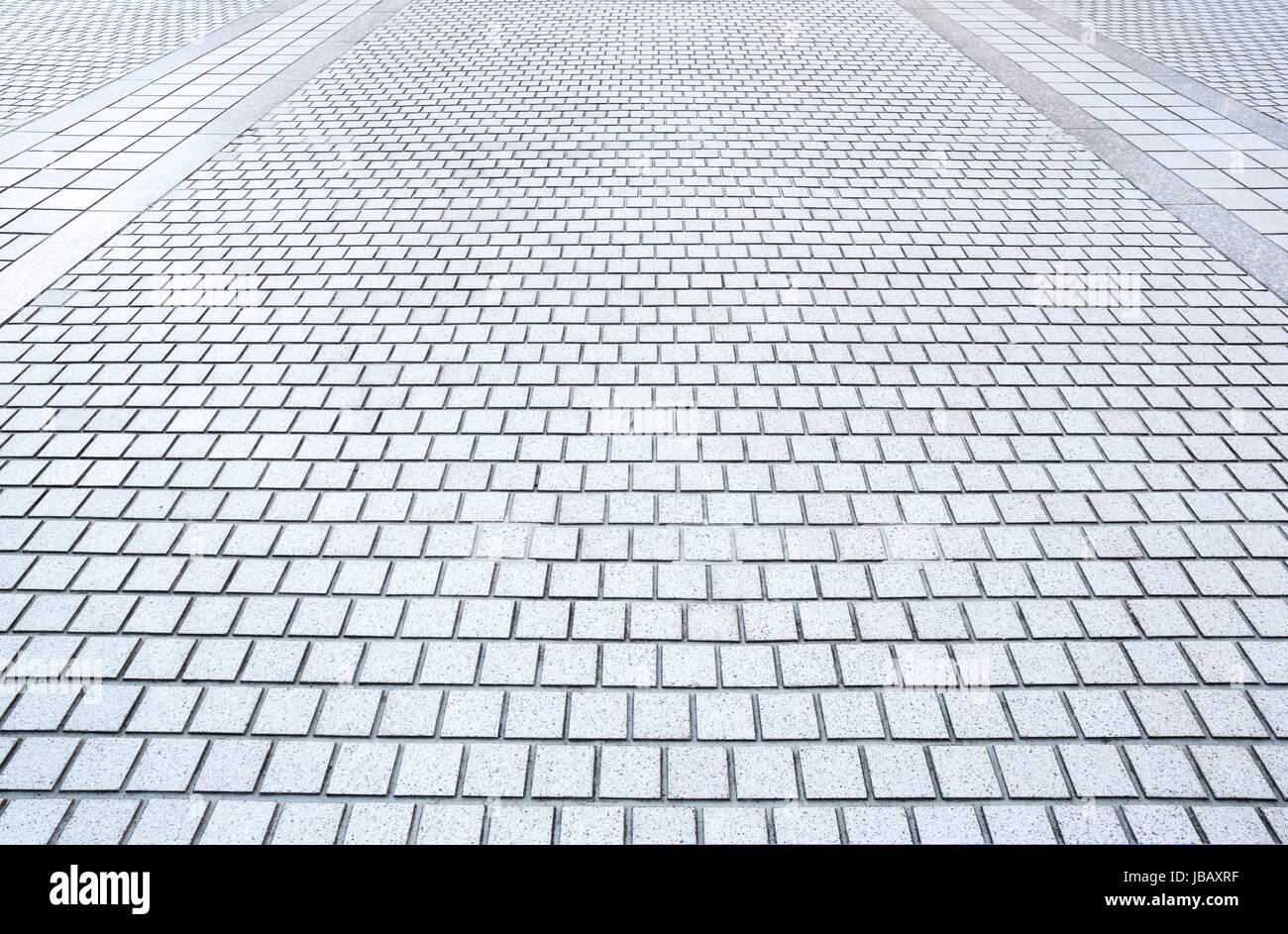 Perspective of concrete brick pavement road Stock Photo - Alamy