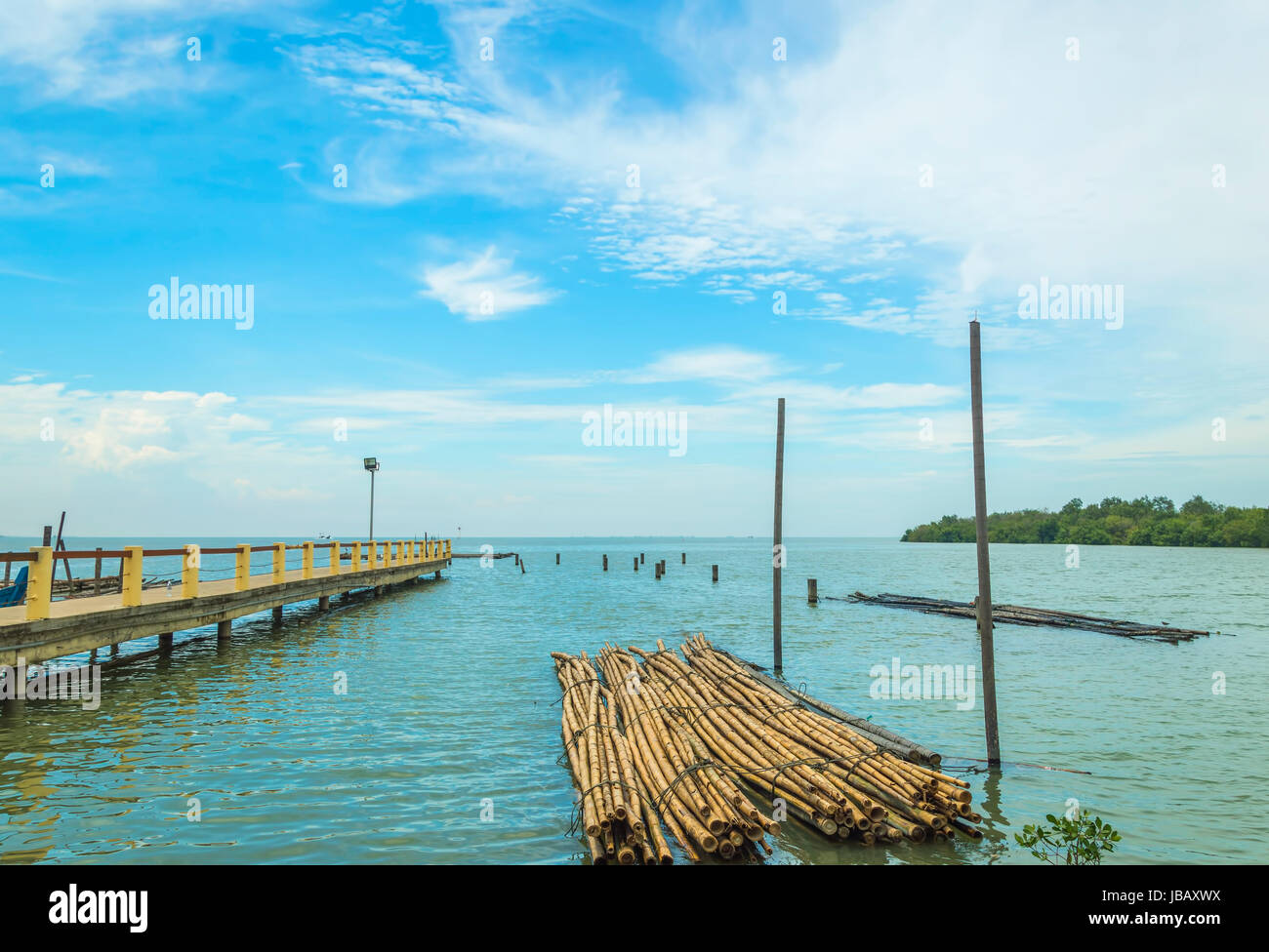 Jetty with blue skies Stock Photo - Alamy