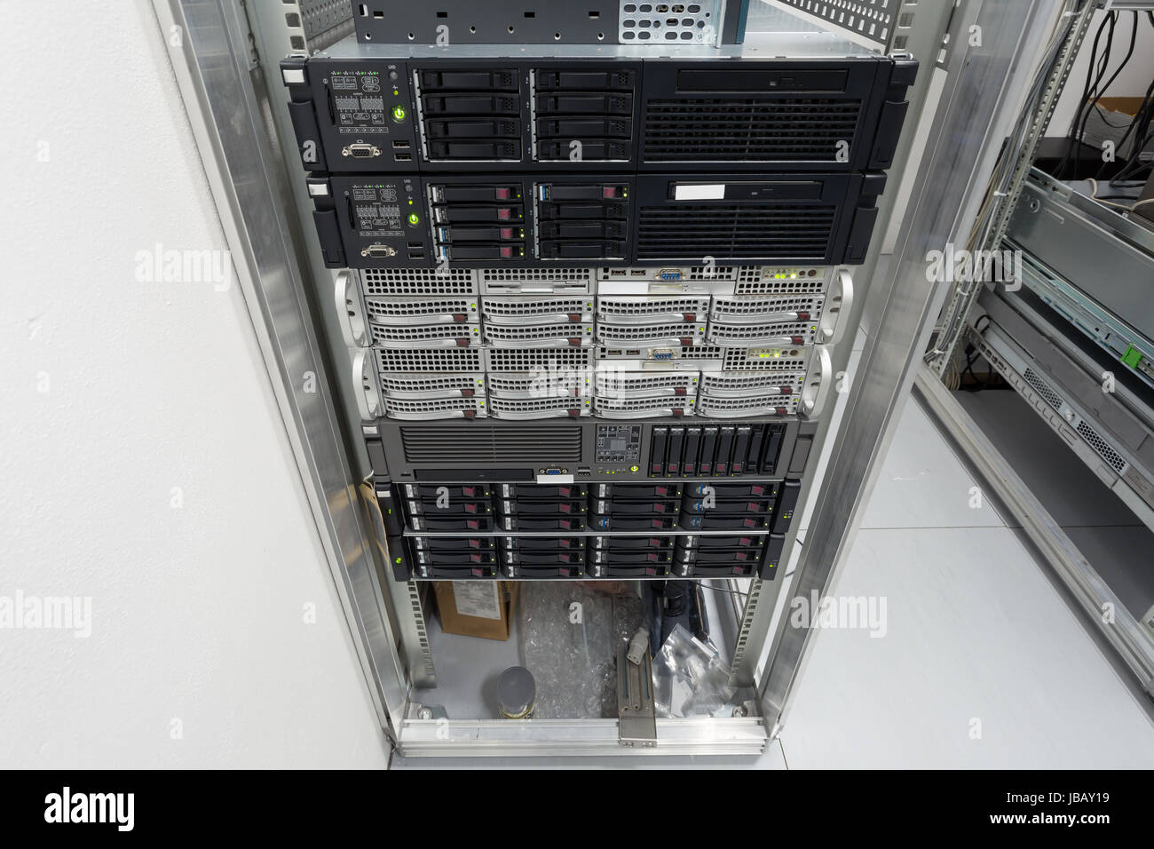servers stack with hard drives in a datacenter for backup and data ...