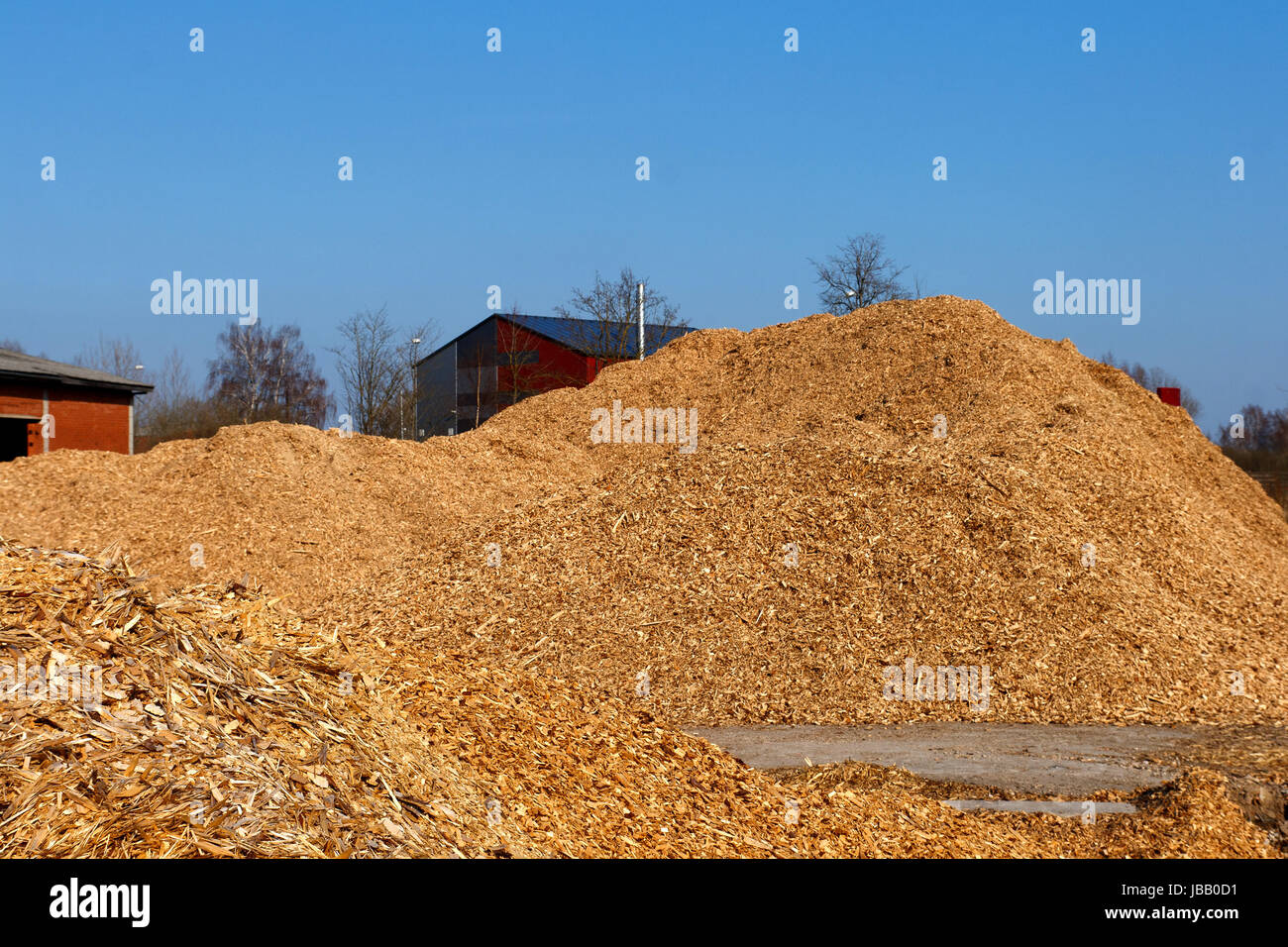 Large Sawdust stacks at the factory Stock Photo - Alamy
