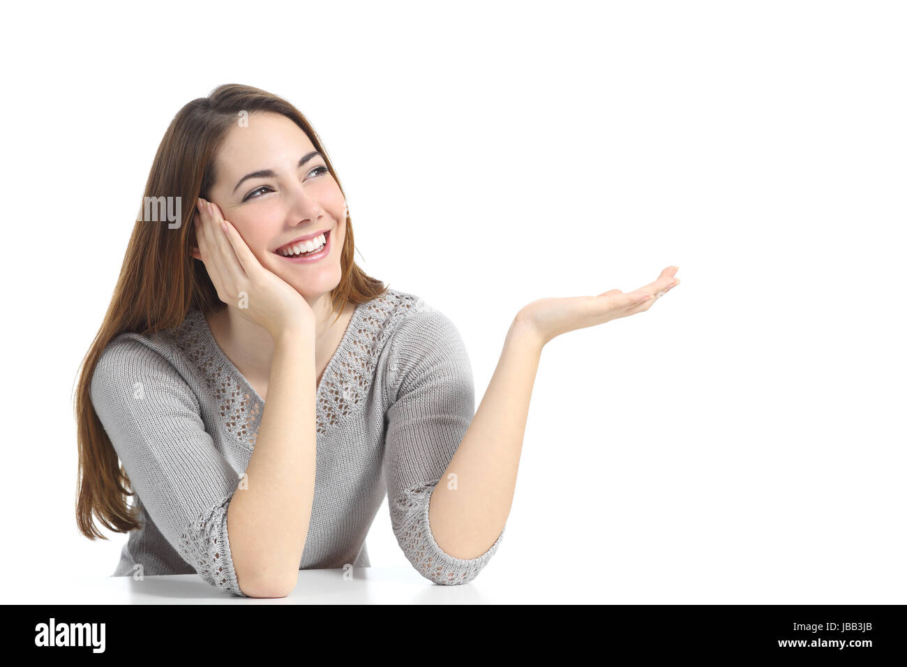 Beautiful happy woman presenting a blank advertising isolated on a ...