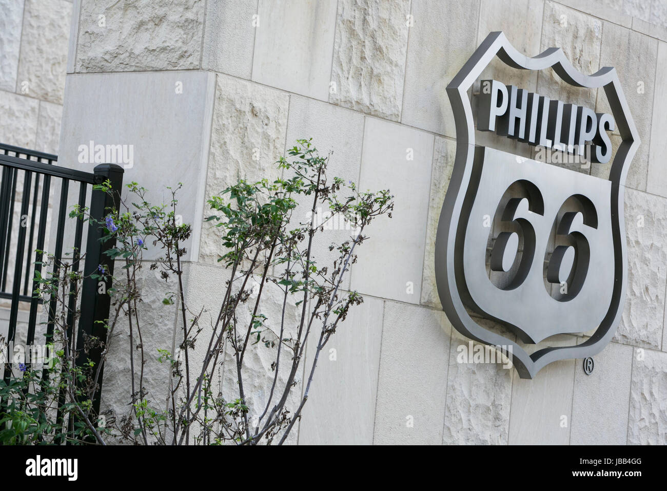 A logo sign outside of a the headquarters of The Phillips 66 Company in ...