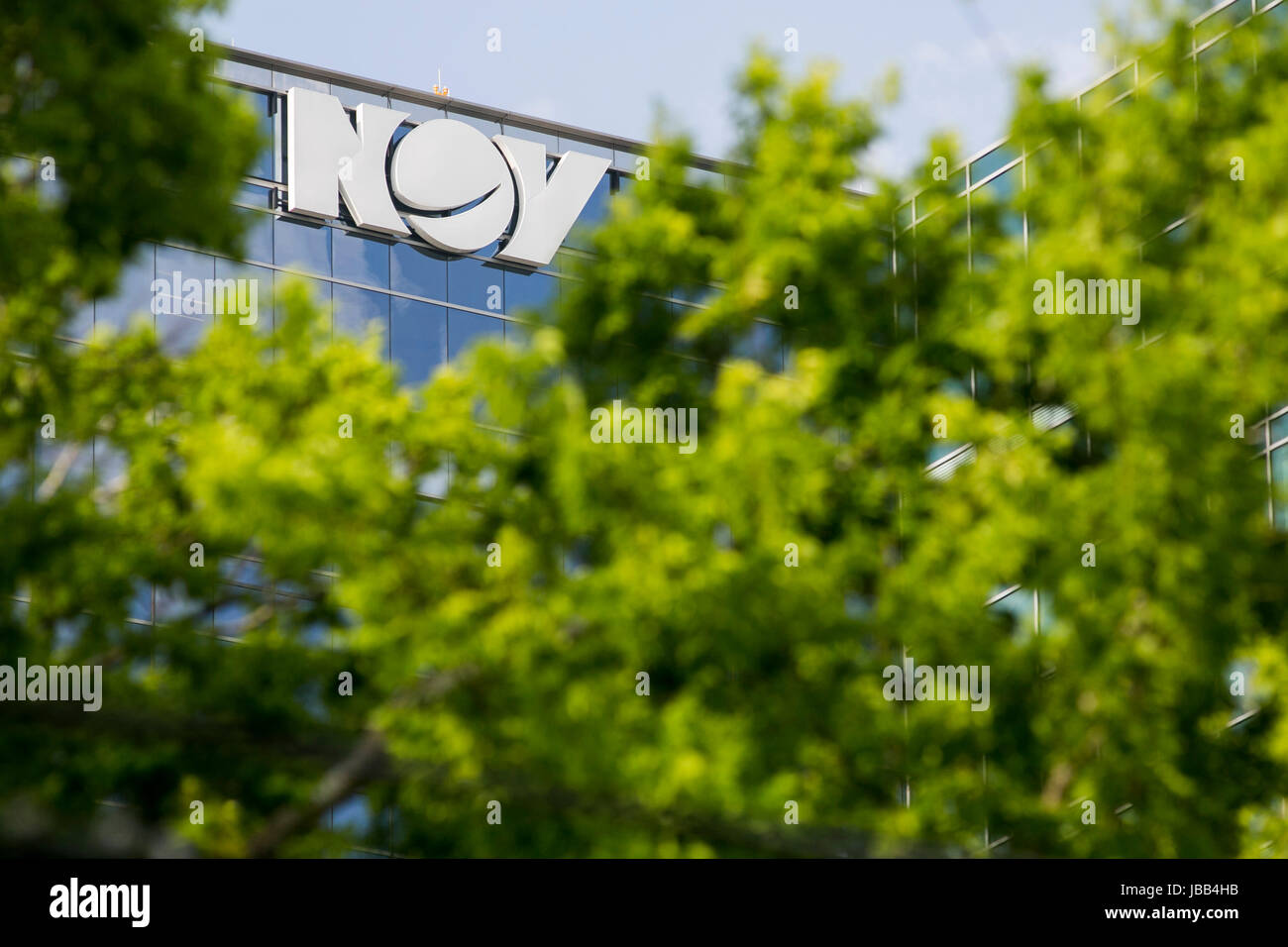 A logo sign outside of a the headquarters of National Oilwell Varco in ...
