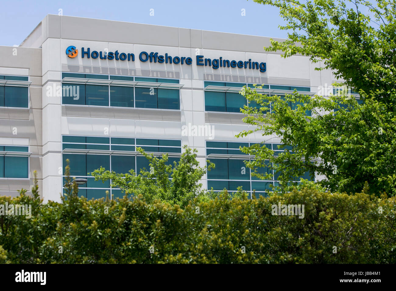 A logo sign outside of the headquarters of Houston Offshore Engineering ...