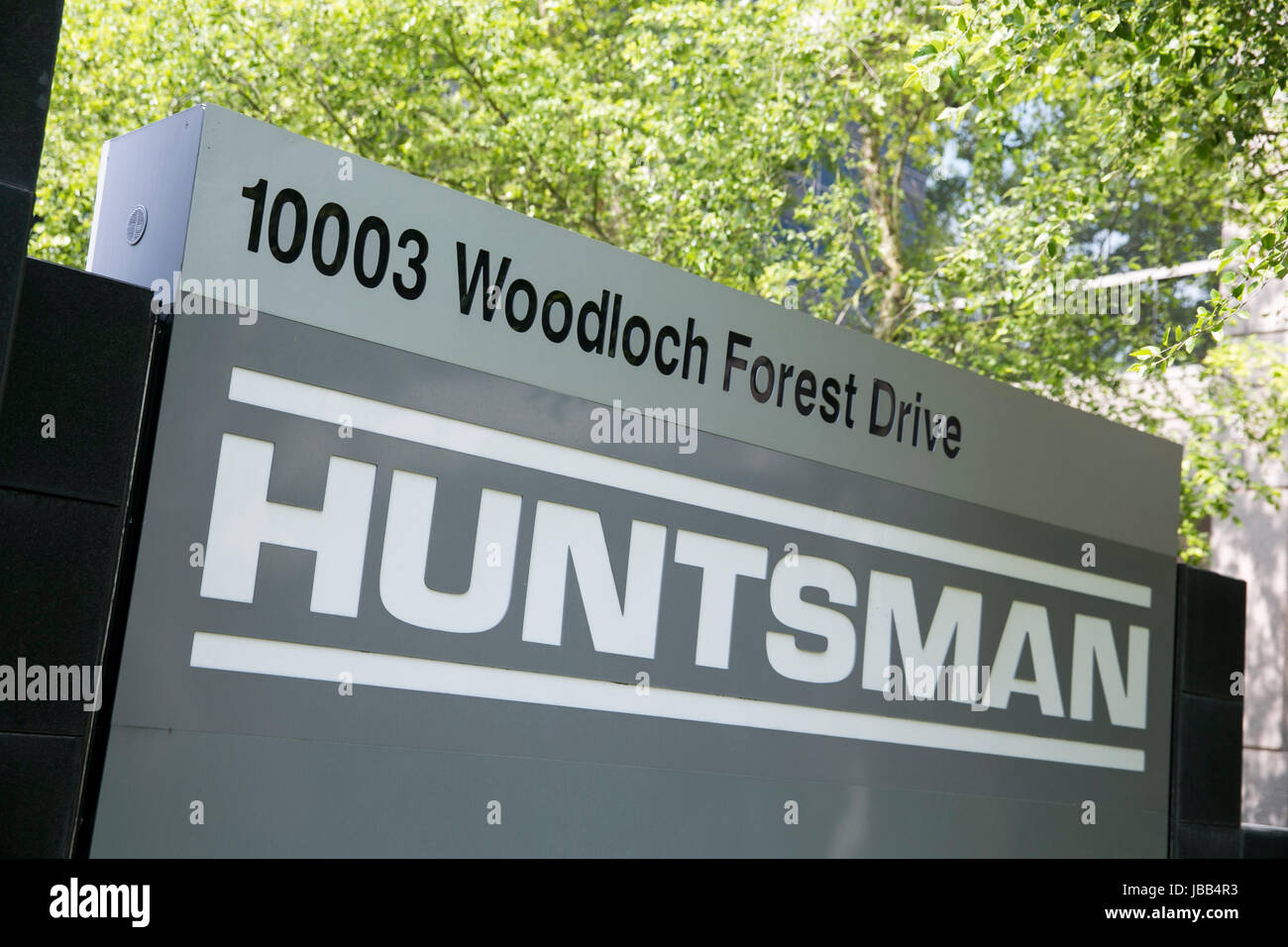 A logo sign outside of the headquarters of the Huntsman Corporation in ...