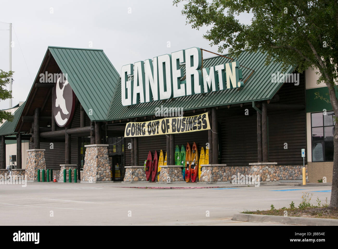 A "Going Out Of Business" banner at a Gander Mountain retail store in ...