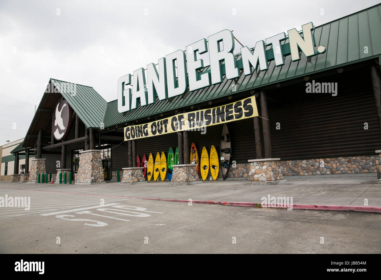 A "Going Out Of Business" banner at a Gander Mountain retail store in ...