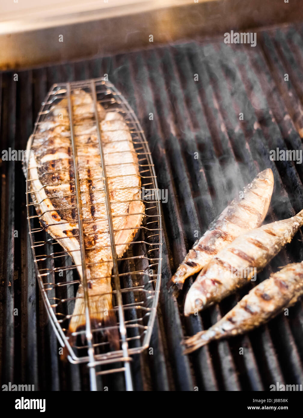 Fish on the grill in a Portugese Restaurant Stock Photo - Alamy