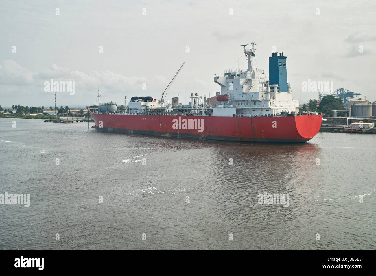 chemical tanker in abidjan harbour during loading chemical product ...