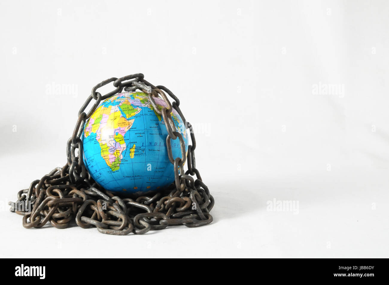 Chained world globe hi-res stock photography and images - Alamy