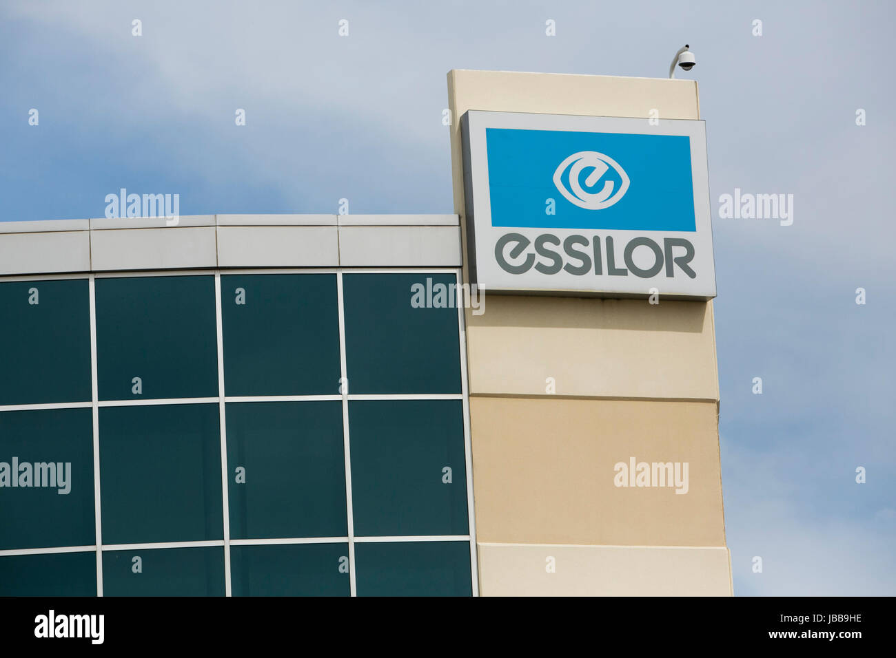 A logo sign outside of the headquarters of Essilor of America in Dallas ...