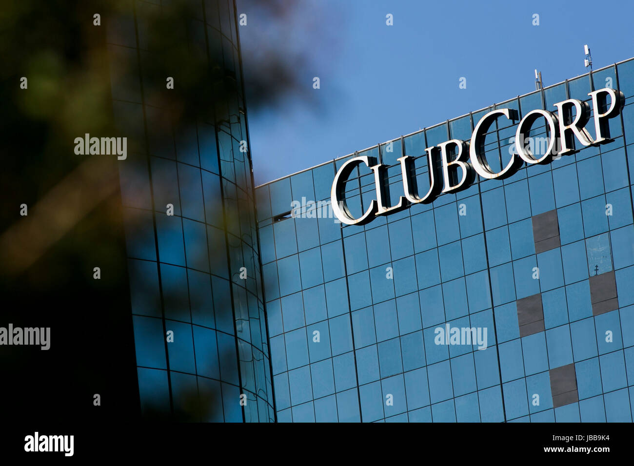 A logo sign outside of the headquarters of ClubCorp in Dallas, Texas ...