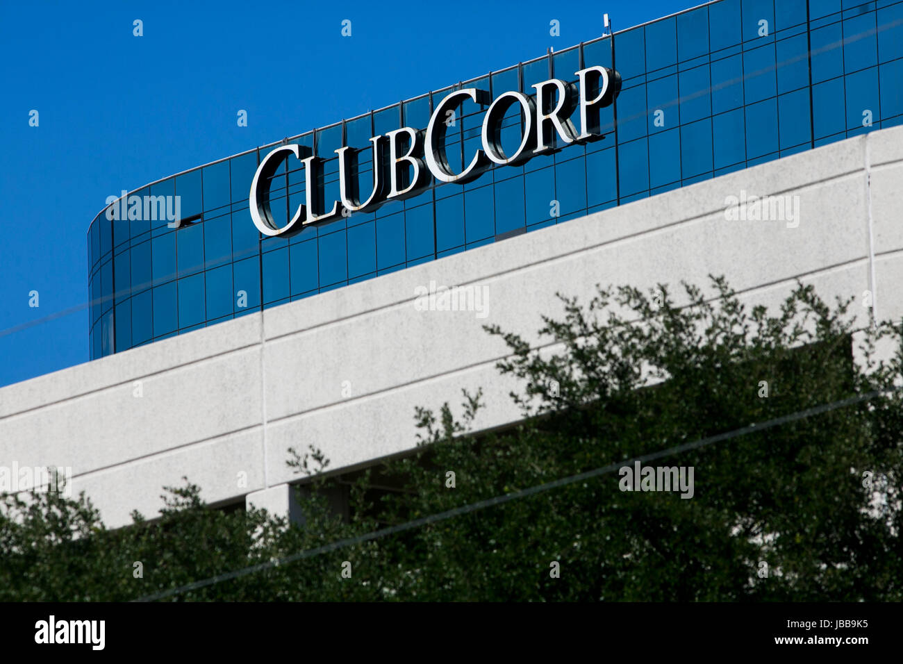 A logo sign outside of the headquarters of ClubCorp in Dallas, Texas ...