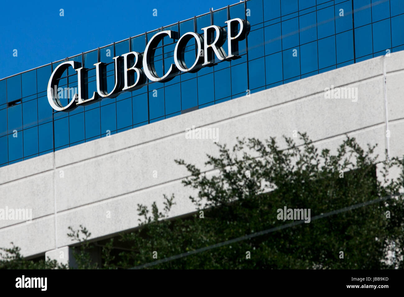 A logo sign outside of the headquarters of ClubCorp in Dallas, Texas ...