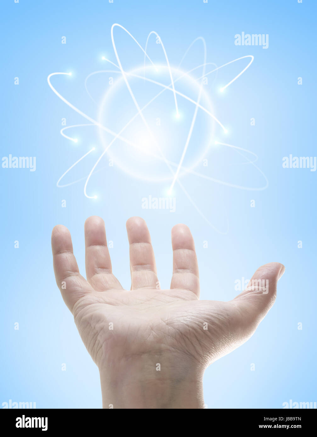 Power in the hands controlling a ball of energy Stock Photo - Alamy