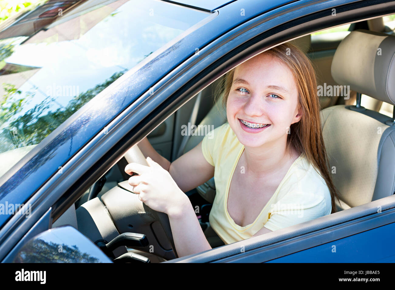 Teenage female driving student learning to drive a car Stock Photo - Alamy