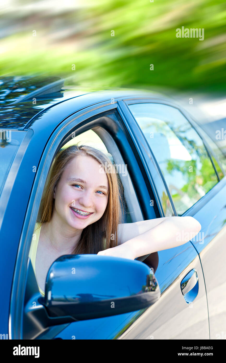 Teenage female driving student learning to drive a car Stock Photo - Alamy