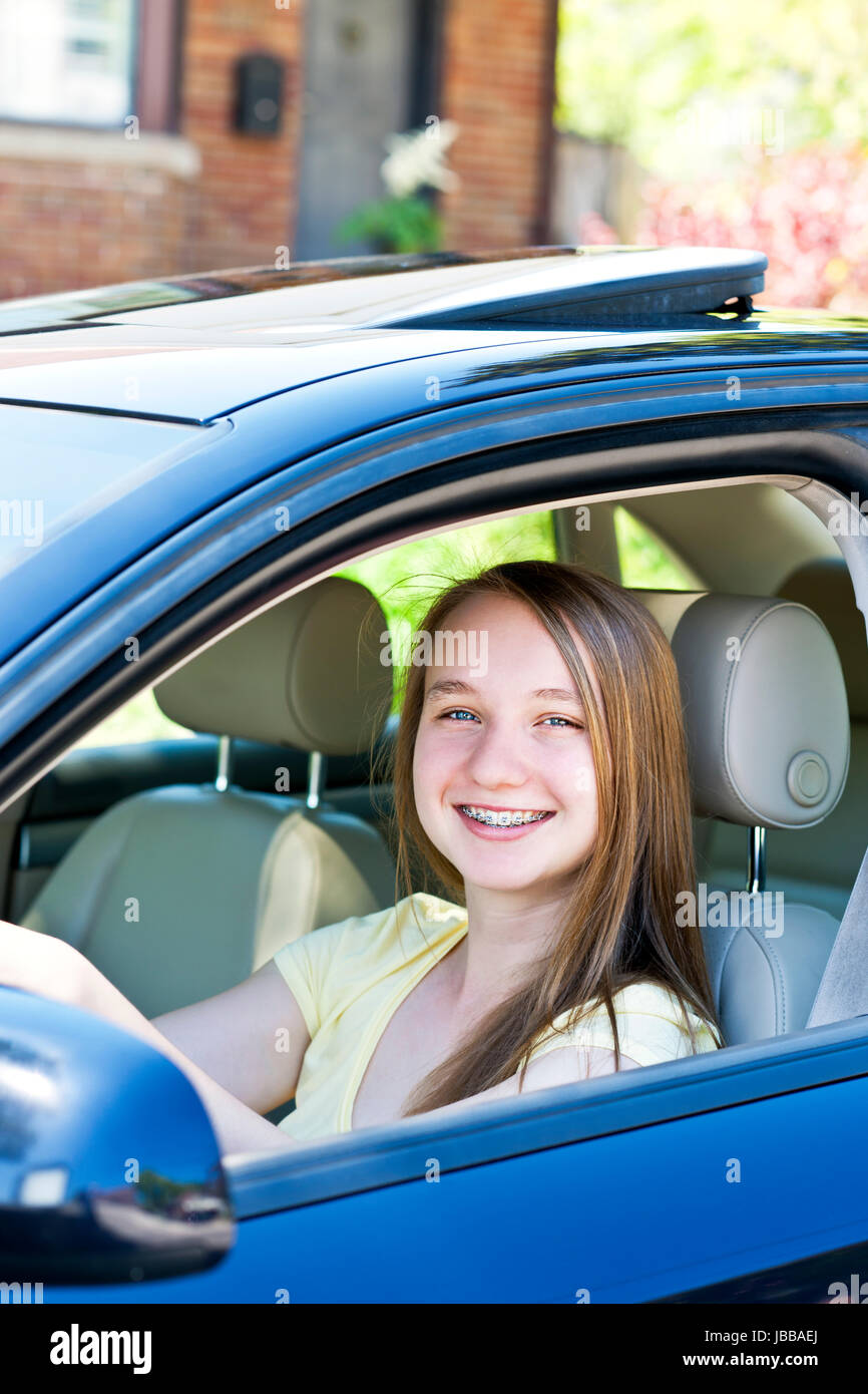 Teenage female driving student learning to drive a car Stock Photo - Alamy