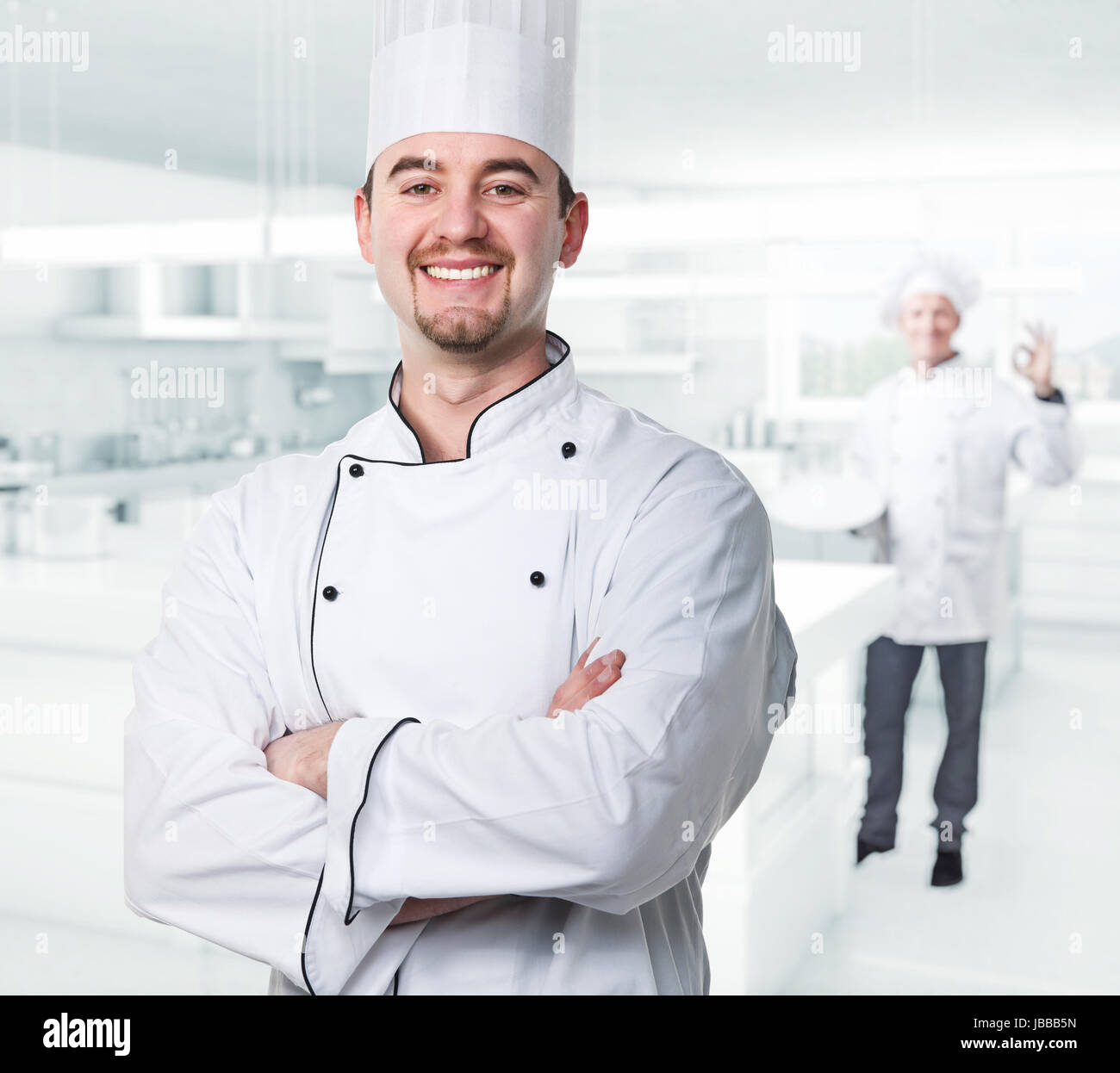 chef portrait and kitchen background Stock Photo - Alamy