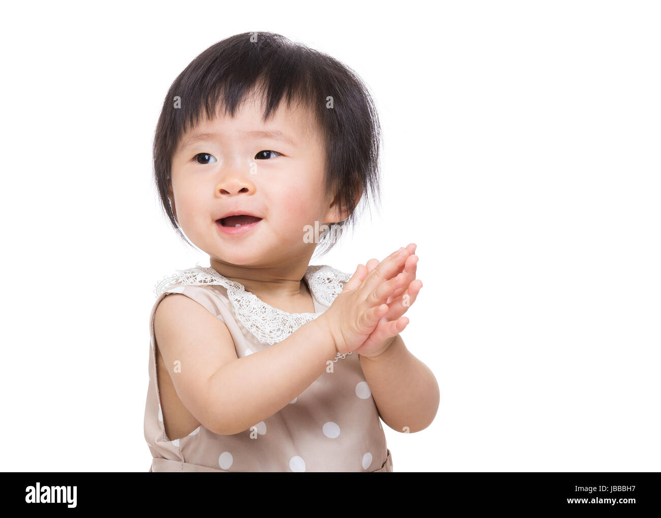 Asia baby girl clapping hand Stock Photo - Alamy