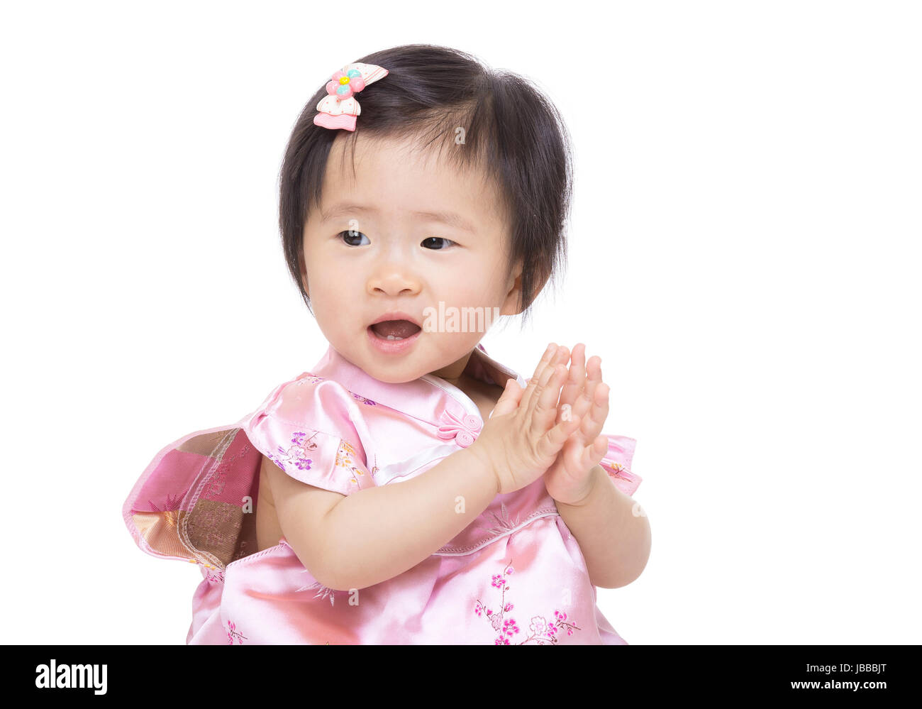 Chinese baby girl clapping hand Stock Photo - Alamy