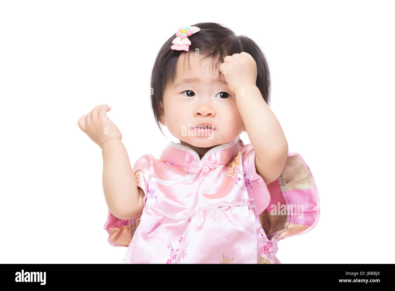 Chinese baby girl touch her head Stock Photo - Alamy