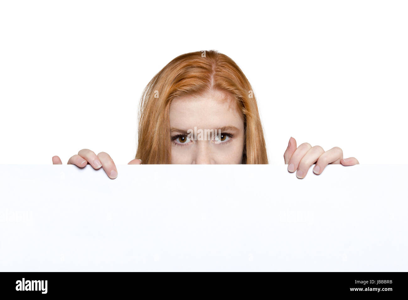 Cute teen girl holding a white sign Stock Photo - Alamy