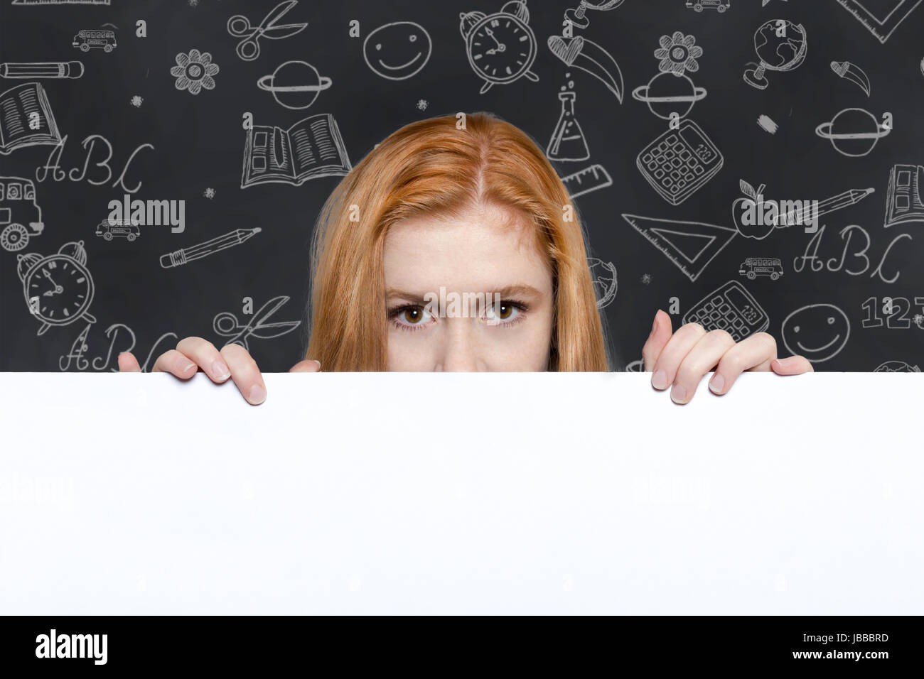 Cute teen girl holding a white sign Stock Photo - Alamy