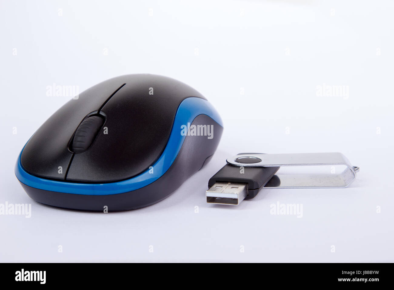 Pure white background with computer mouse and usb stick Stock Photo - Alamy