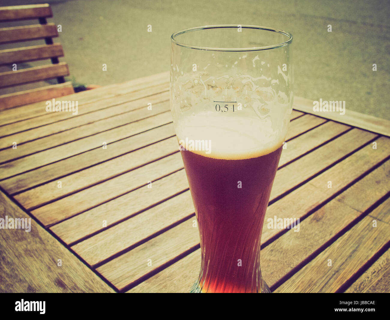 Vintage retro looking A glass of German weiss beer Stock Photo - Alamy